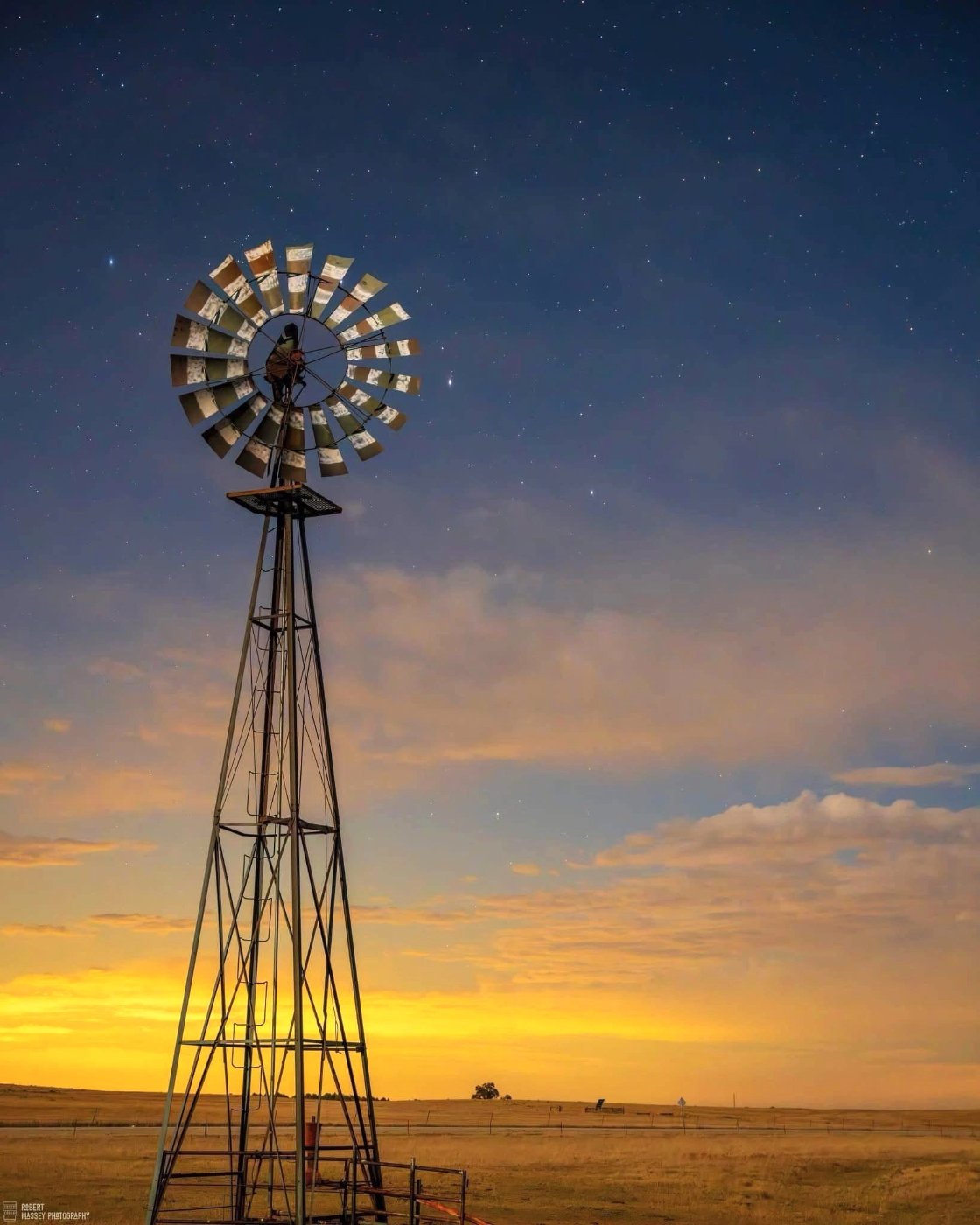 Solve Beautifully lit windmill jigsaw puzzle online with 42 pieces