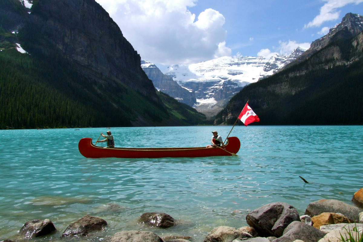 Solve Canoeing on Lake Louise jigsaw puzzle online with 70 pieces