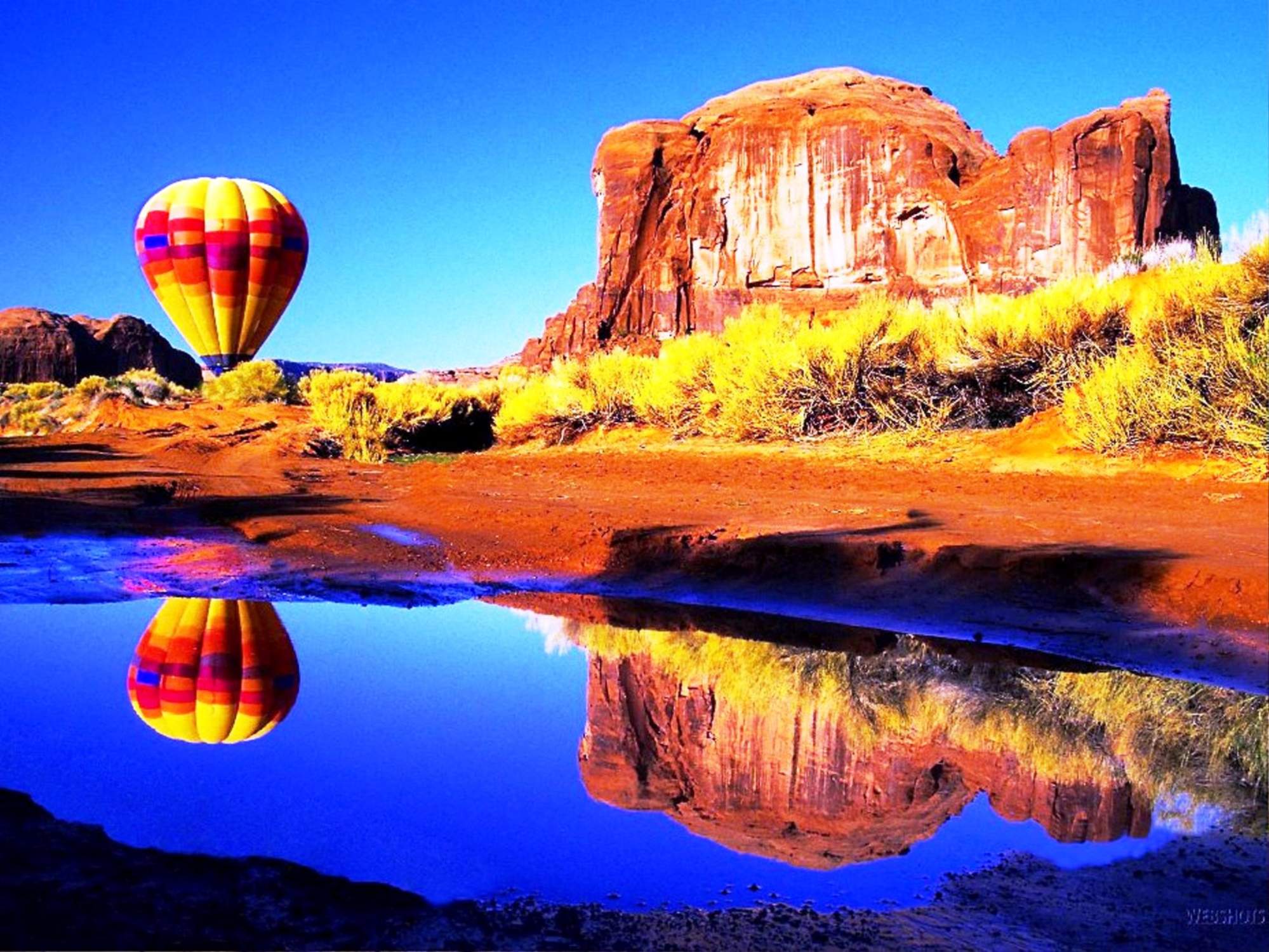 Solve Balloon & Hill Reflection jigsaw puzzle online with 588 pieces