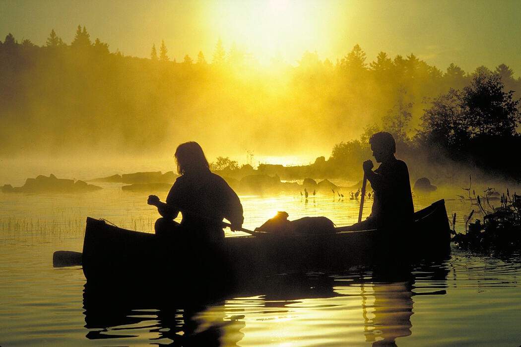 Solve Canoeing to warm the soul jigsaw puzzle online with 96 pieces