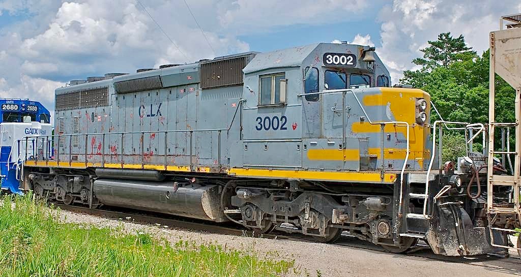 Solve Great Lakes Leasing SD40-2 #3002 ex CPR, north of White Cloud, MI ...