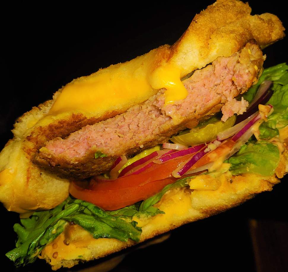 Solve Our local burger place makes a burger with 2 grilled cheese ...