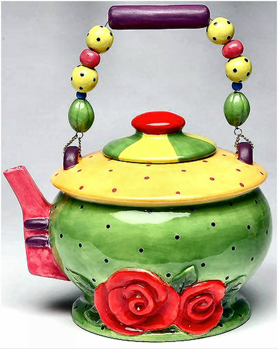 Solve Green & Yellow Teapot jigsaw puzzle online with 320 pieces