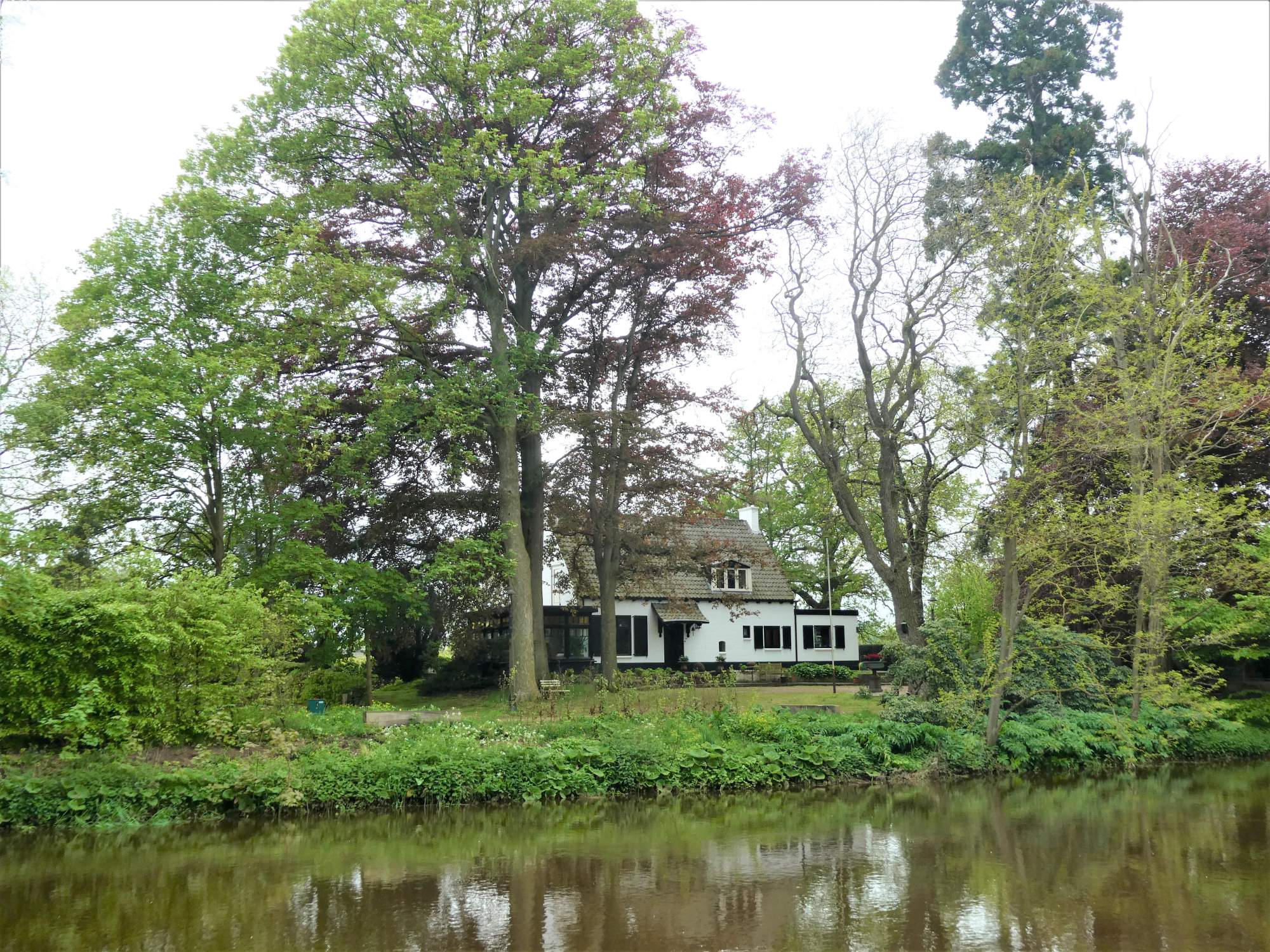 Solve Lovely house along the river De Regge jigsaw puzzle online with ...