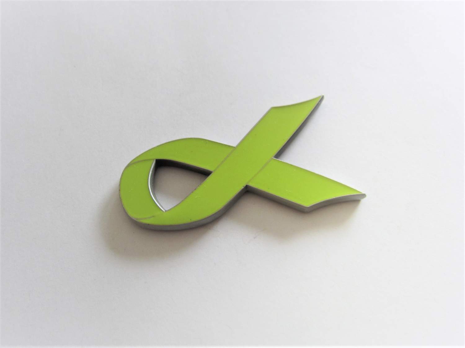 Solve Mental Health Charity Geocoin jigsaw puzzle online with 99 pieces