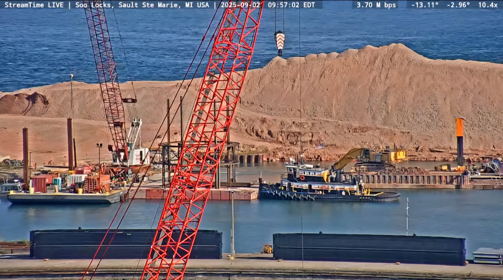 Solve Construction at the Soo Locks jigsaw puzzle online with 66 pieces