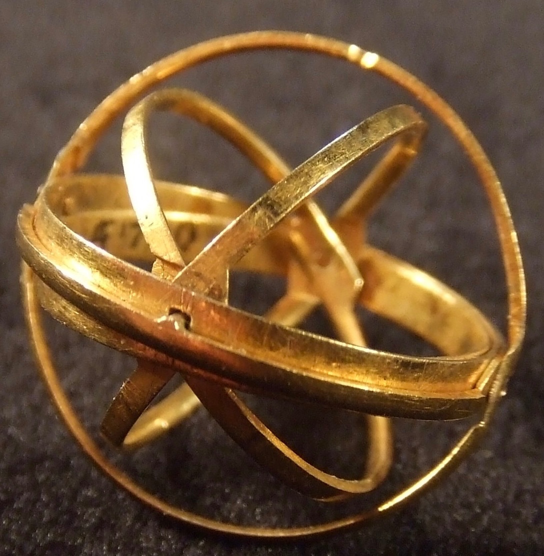 Solve Armillary Sphere Finger Ring jigsaw puzzle online with 64 pieces