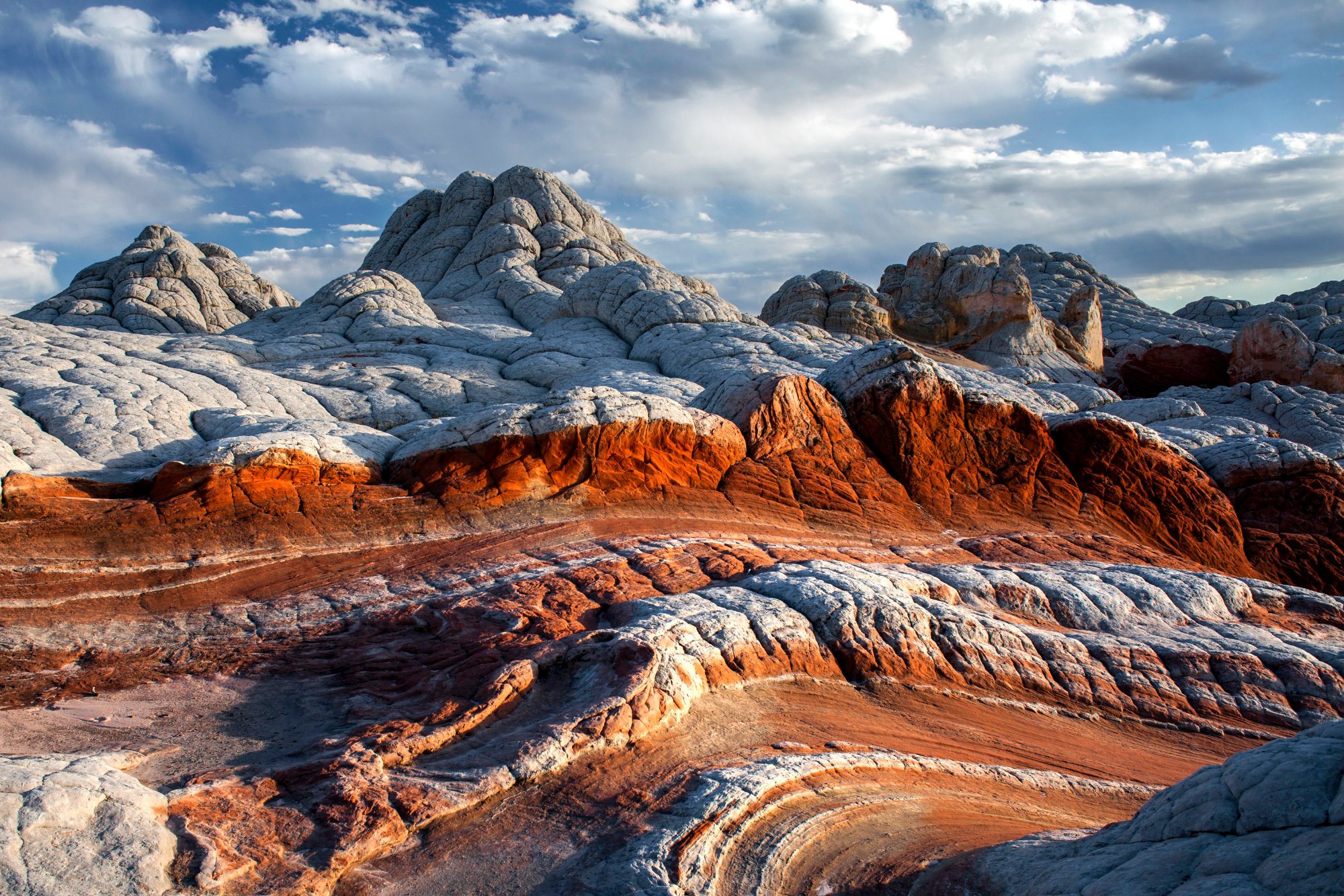 Solve The white and red colors of Navajo sandstone of White Pocket, a ...