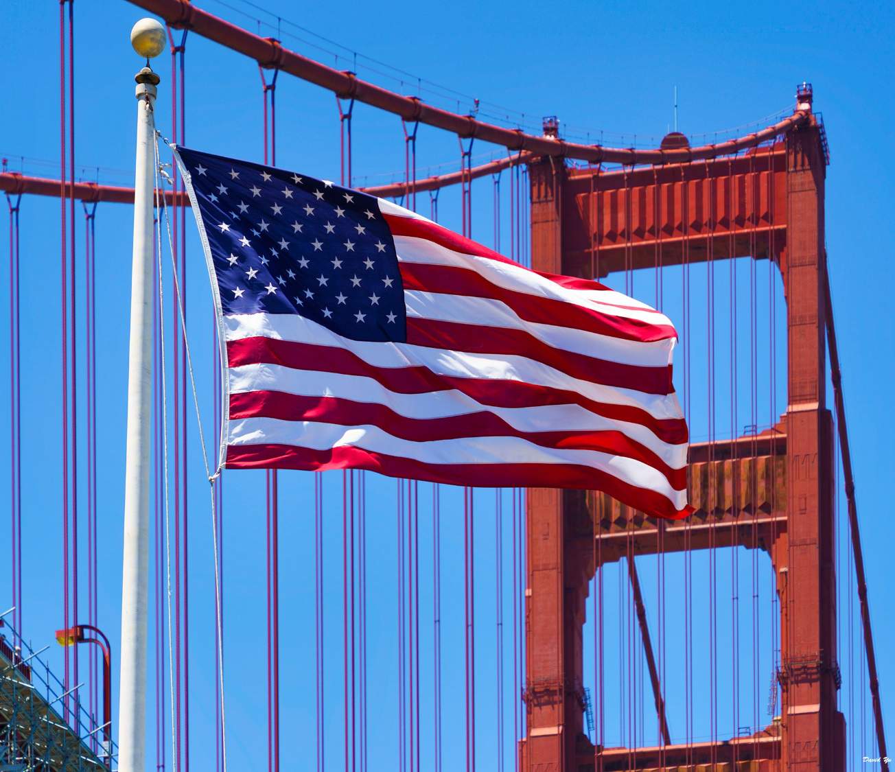 Solve American flag flying at the Golden Gate Bridge jigsaw puzzle ...