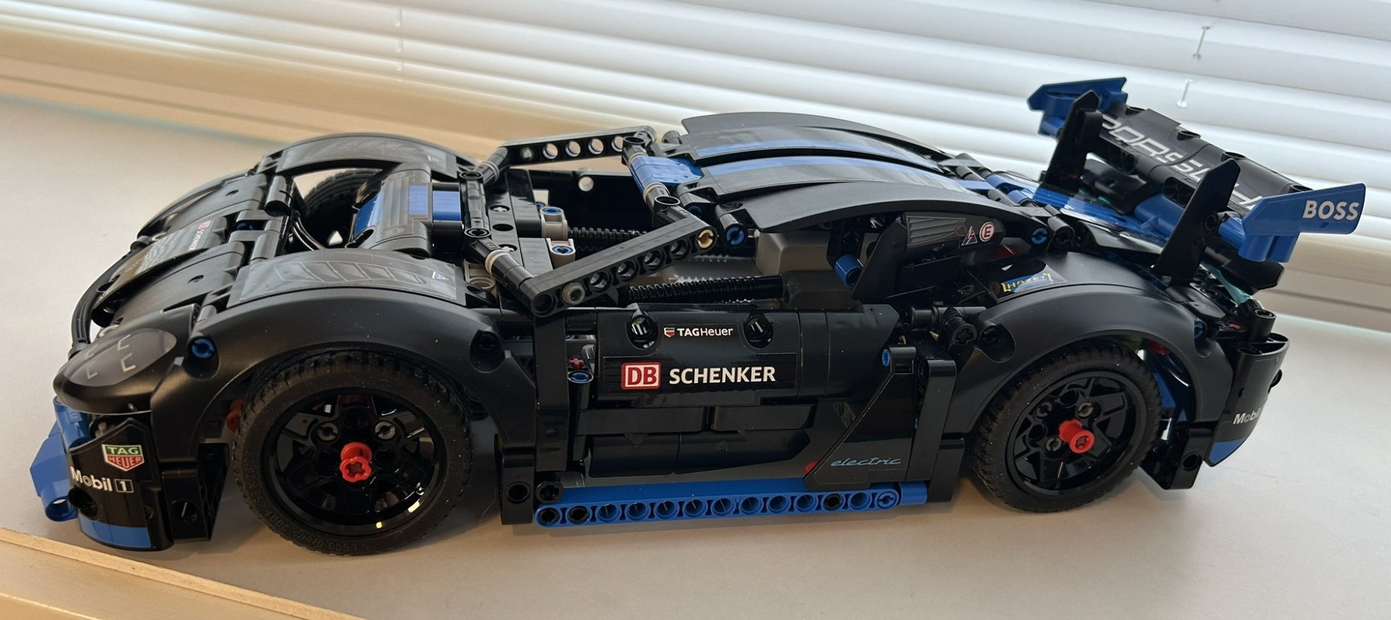 Solve Porsche GT4 e-Performance jigsaw puzzle online with 152 pieces