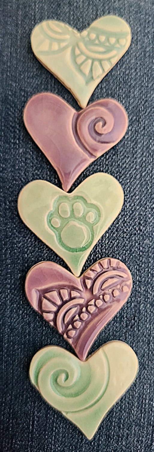 Solve Ceramic Hearts jigsaw puzzle online with 24 pieces