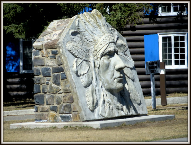 Solve Statue at Banff Museum jigsaw puzzle online with 63 pieces