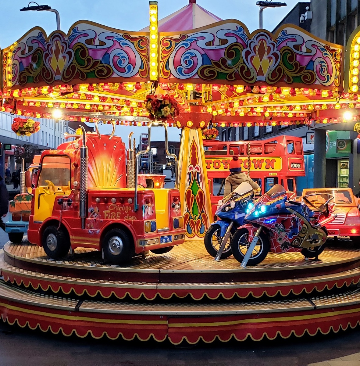 Solve Children’s Roundabout at the Fair jigsaw puzzle online with 36 pieces