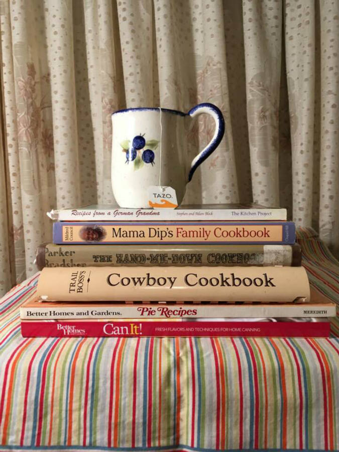 Solve The Cookbook Tea Stack jigsaw puzzle online with 35 pieces