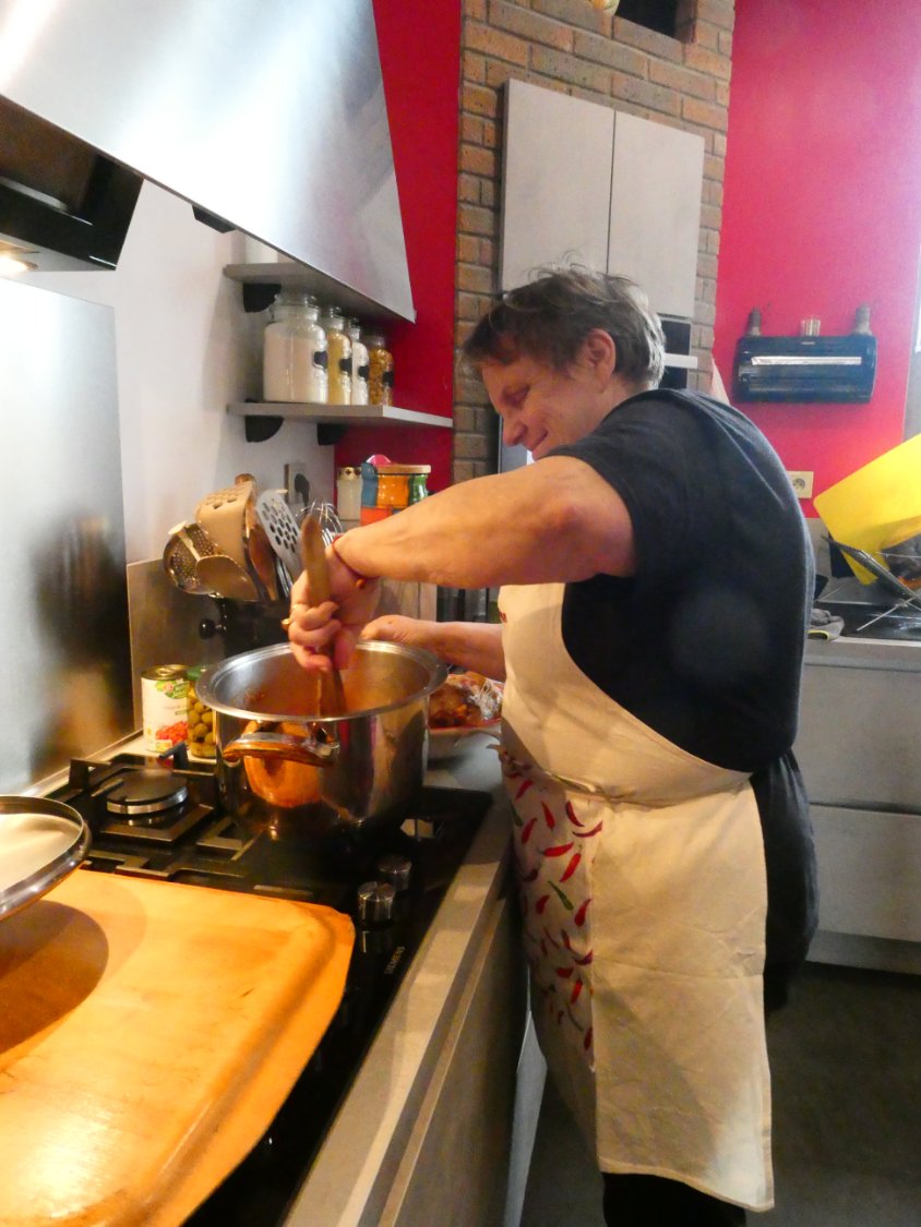 Solve My trip to France. My friend Sylvia, cooking a nice French dinner ...