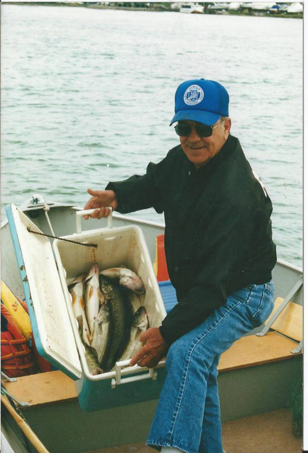 Solve Bud,with some Walleye's in his cooler. jigsaw puzzle online with ...