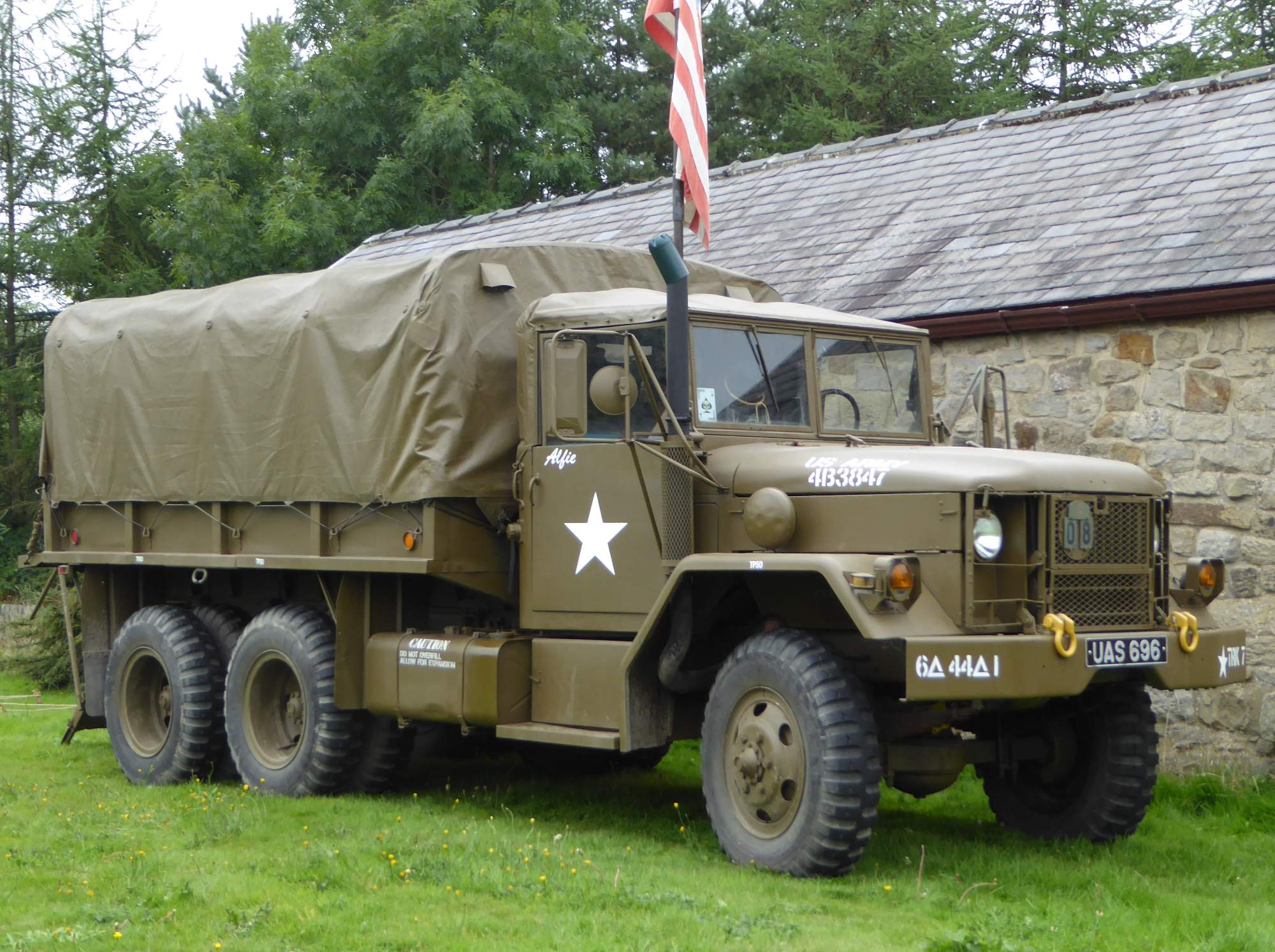Solve 1958 Reo M35 Cargo Truck jigsaw puzzle online with 300 pieces