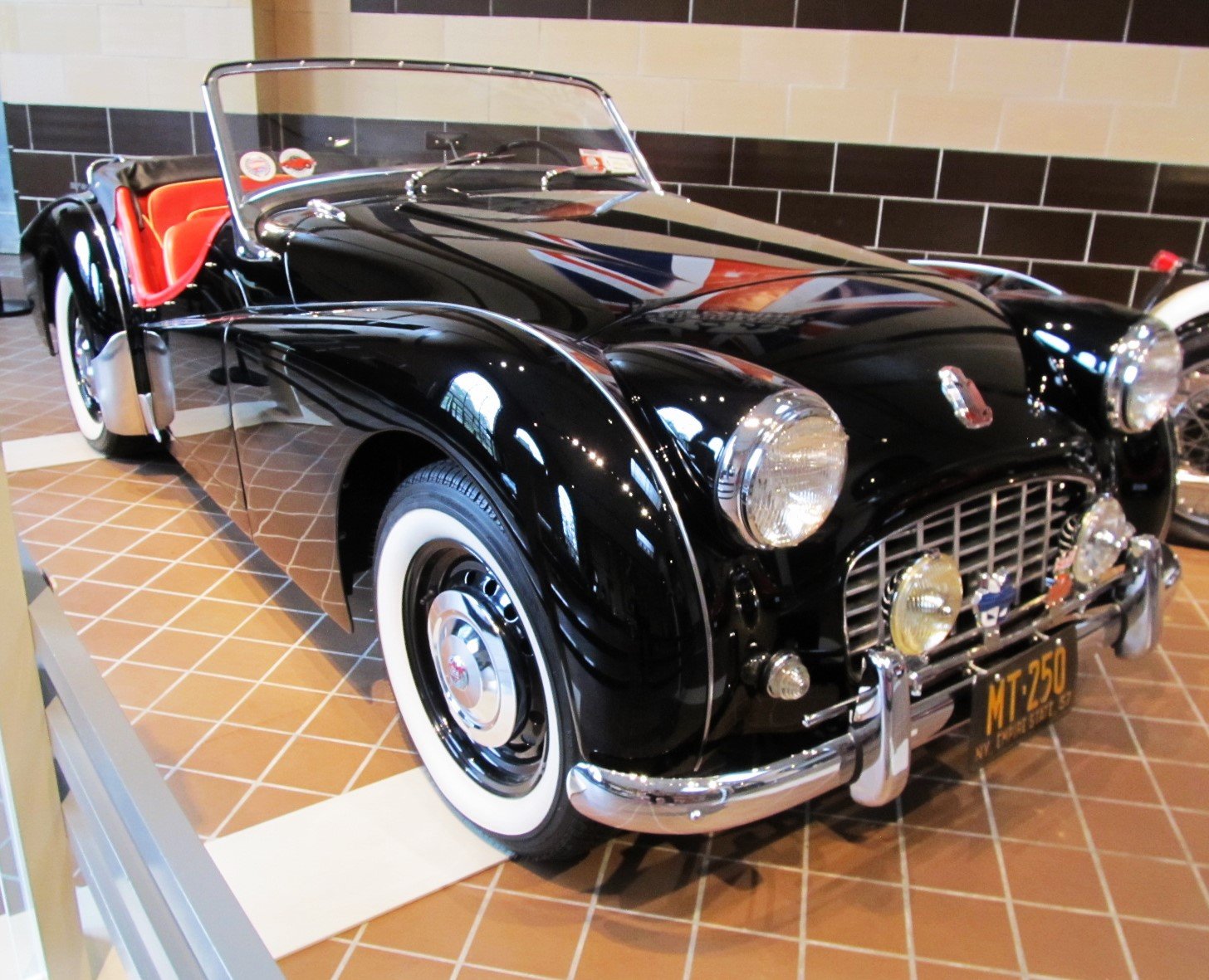 Solve 1957 Triumph TR3- Front And Side jigsaw puzzle online with 99 pieces
