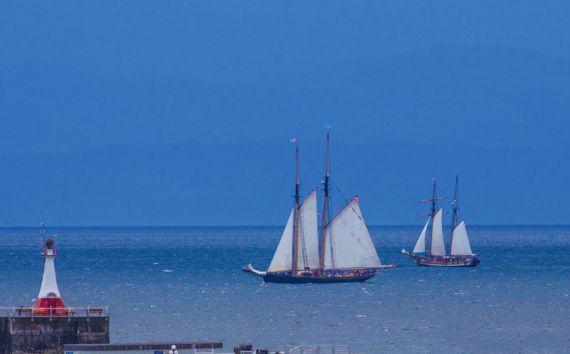 Solve Two sail boats glide past the Victoria Lighthouse. jigsaw puzzle ...