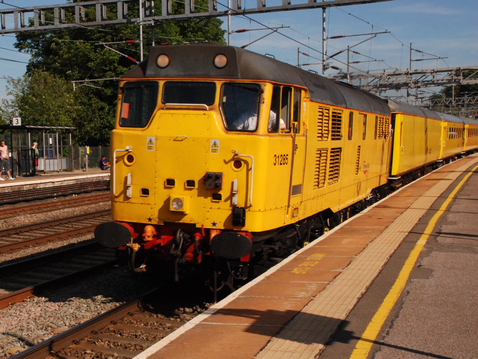 Solve Network Rail Class 31 31285 speeds through Rugeley working a test ...