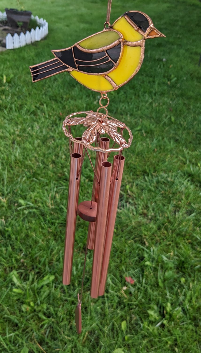 Solve Goldfinch Wind-chime jigsaw puzzle online with 66 pieces