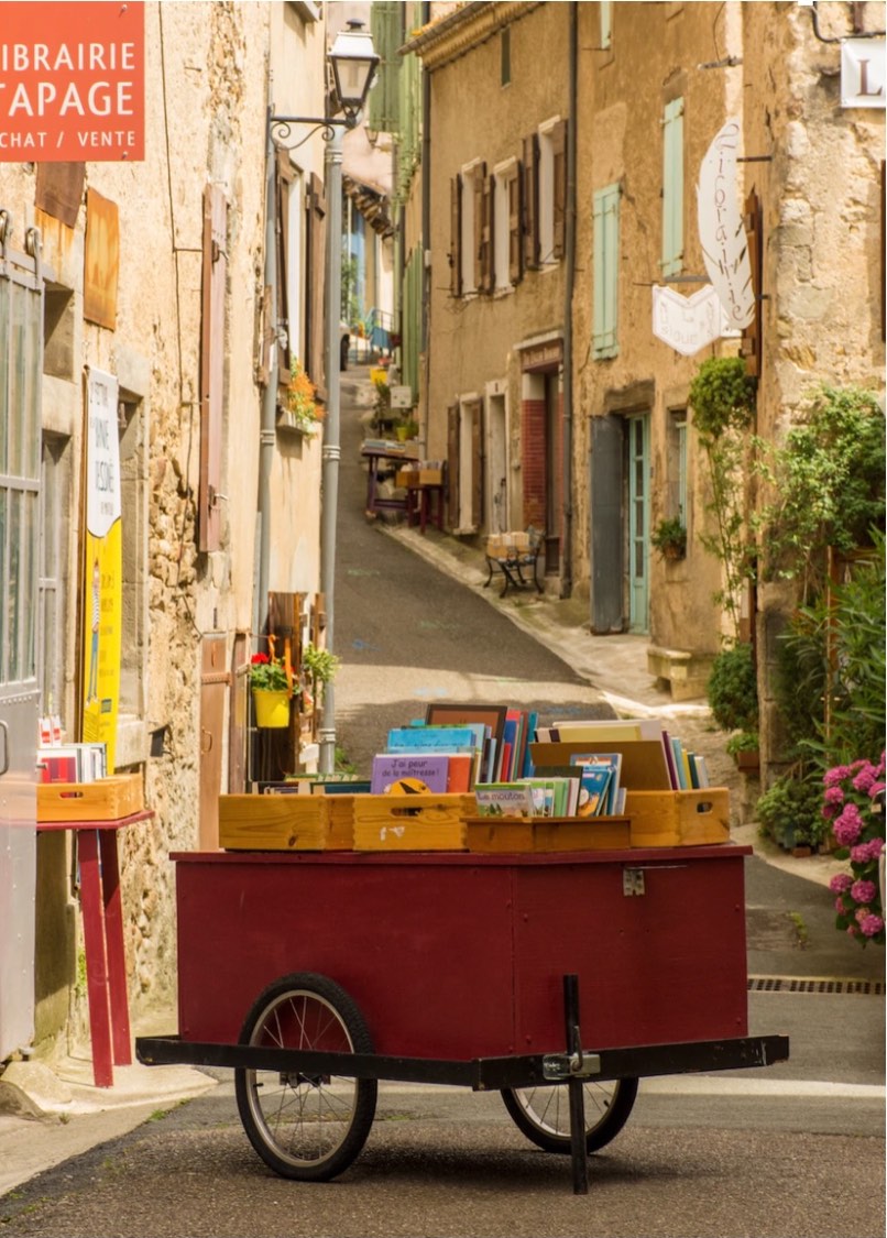 Solve Library book cart in Montolieu, France jigsaw puzzle online with ...