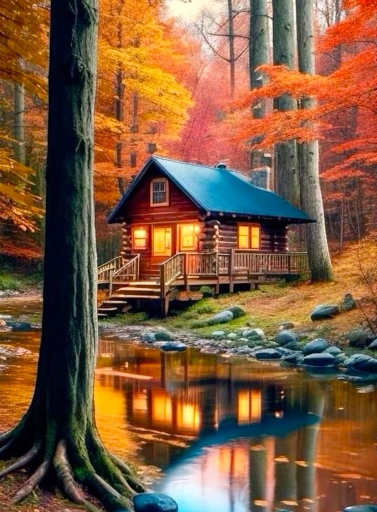 Solve Log Cabin by the Autumn Lake.... jigsaw puzzle online with 24 pieces