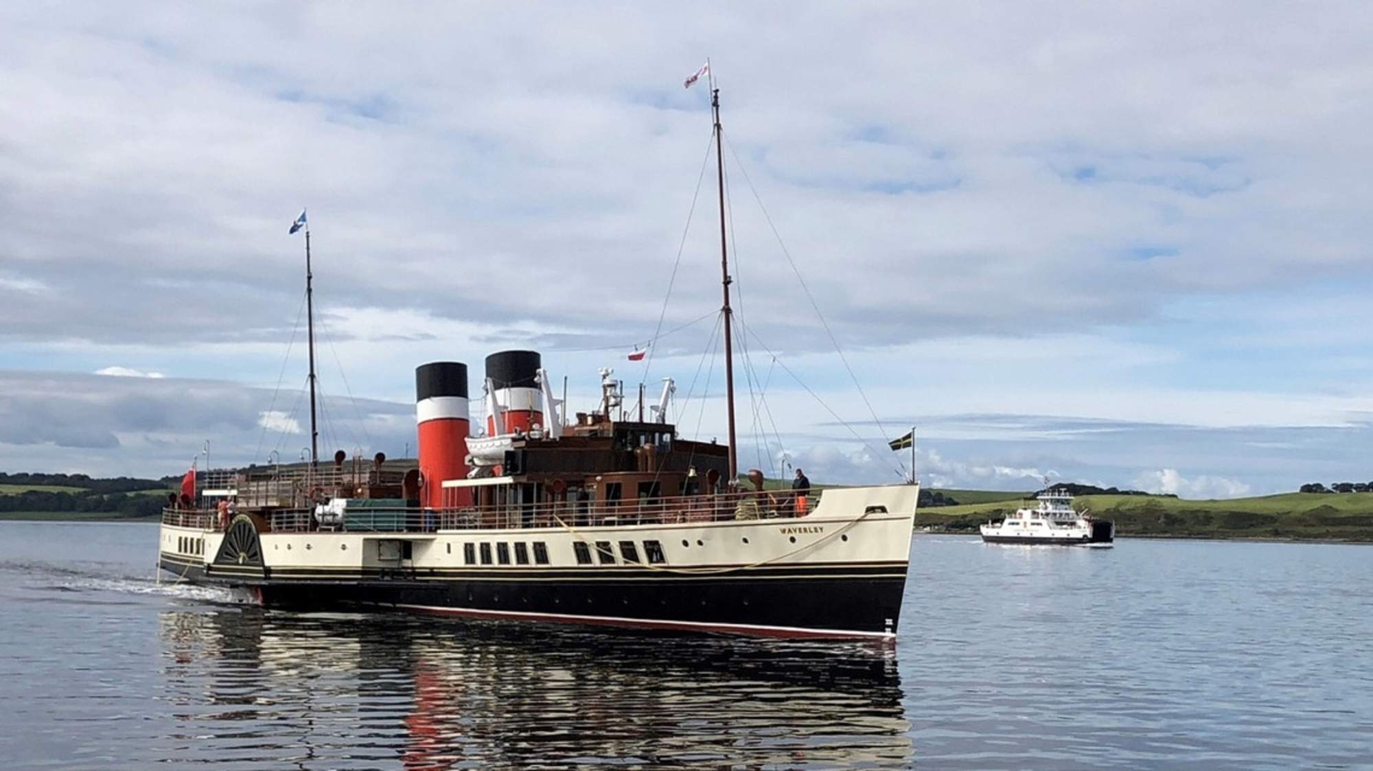 Solve PS Waverley arrives at Largs on the River Clyde, Scotland. jigsaw ...
