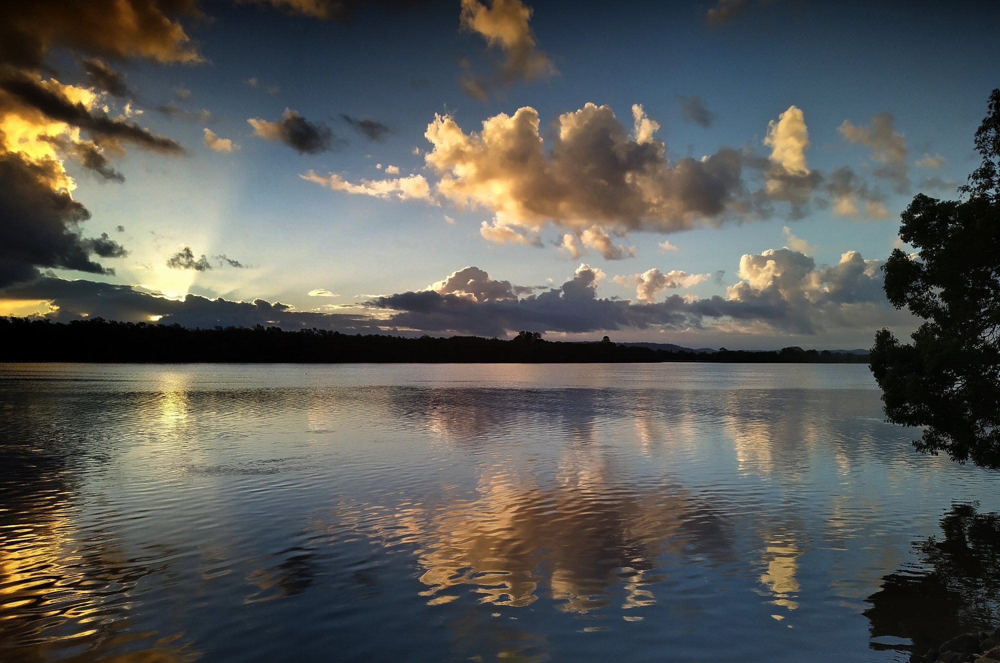 Solve The sun setting over The Clarence River jigsaw puzzle online with ...