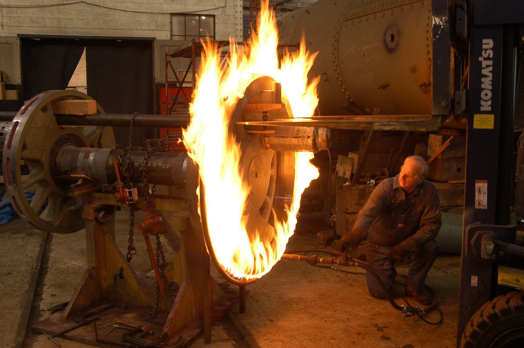 Solve Ring of Fire—Heat shrinking metal tire on locomotive wheel jigsaw ...