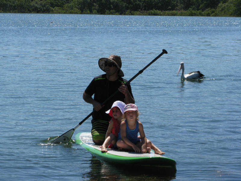 Solve Greg taking Carly & Sydney for a ride on the stand-up paddle ...