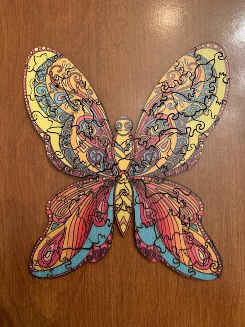 Solve Butterfly Wooden Puzzle jigsaw puzzle online with 80 pieces