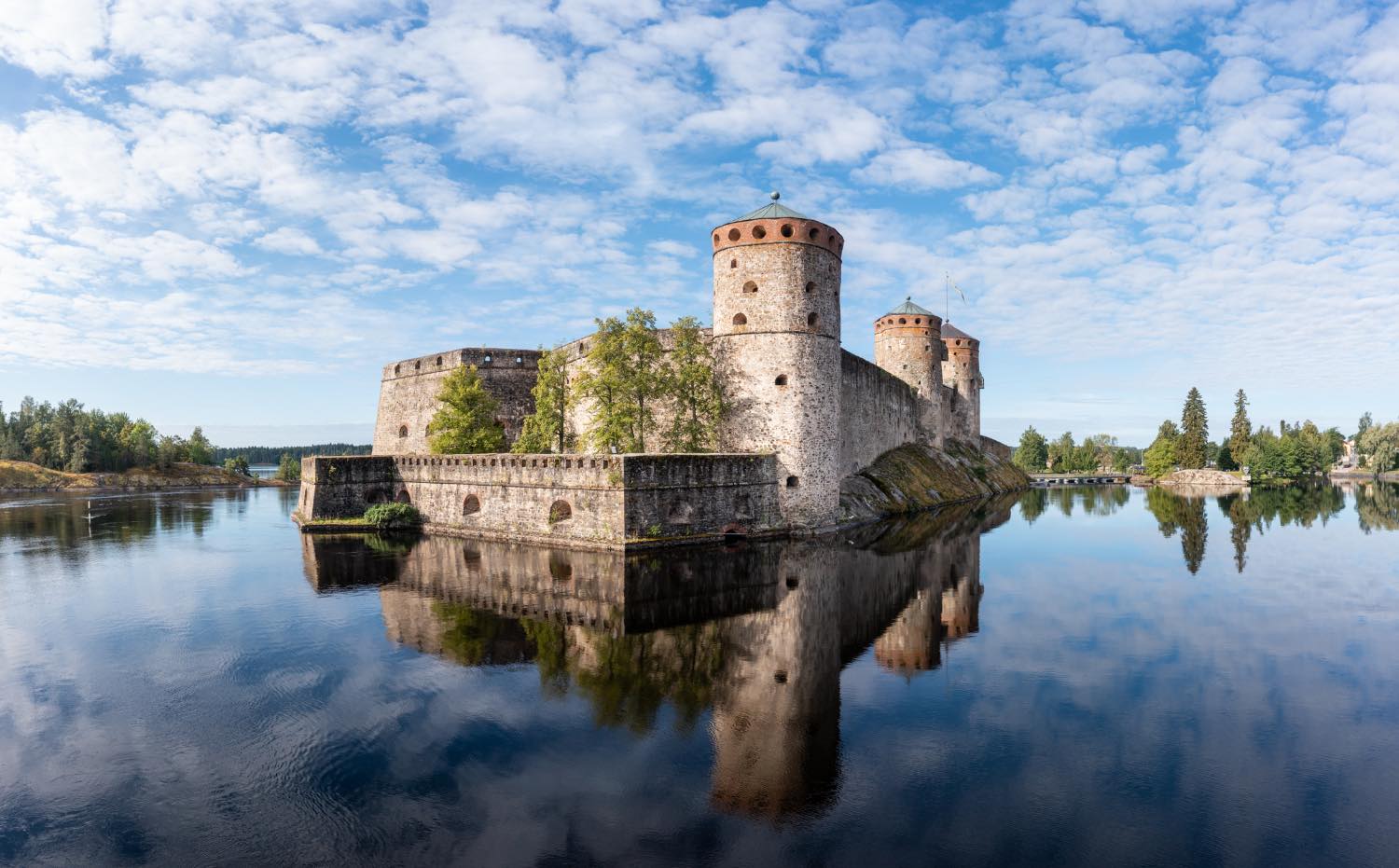 Solve Olavinlinna Castle, Finland jigsaw puzzle online with 77 pieces