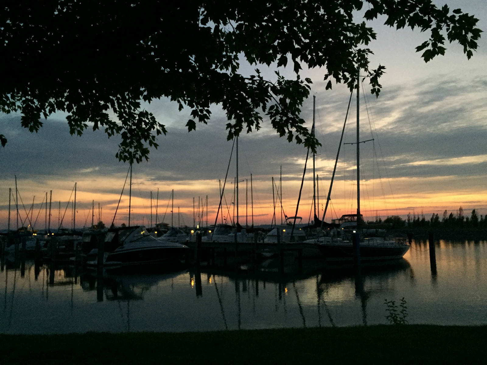 Solve Elk Rapids Harbor at Sunset jigsaw puzzle online with 192 pieces