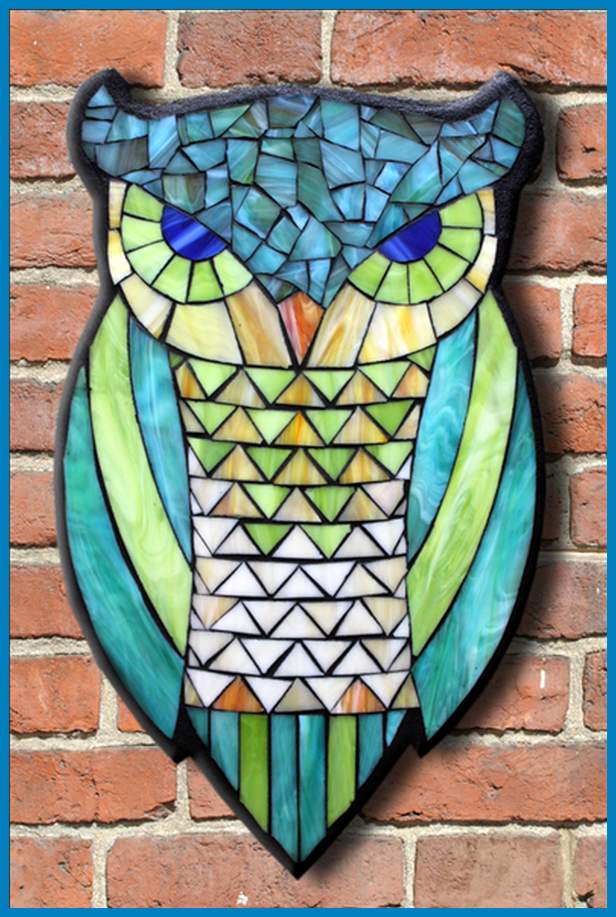 Solve Owl in stained glass jigsaw puzzle online with 12 pieces