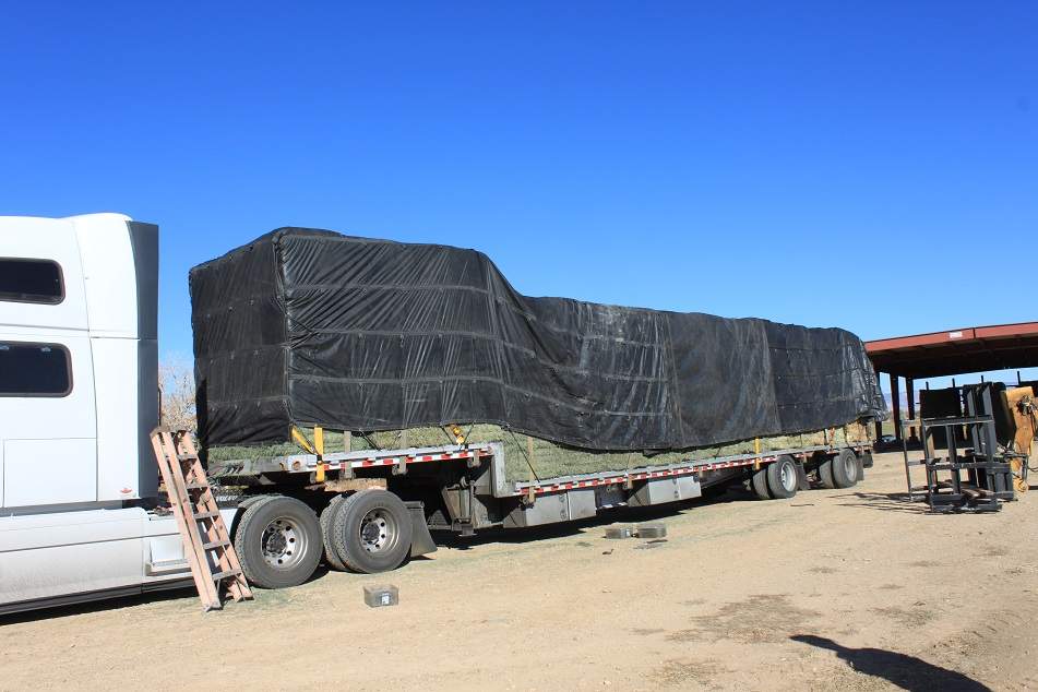 Solve Front of the load tarped correctly for transport over the ...