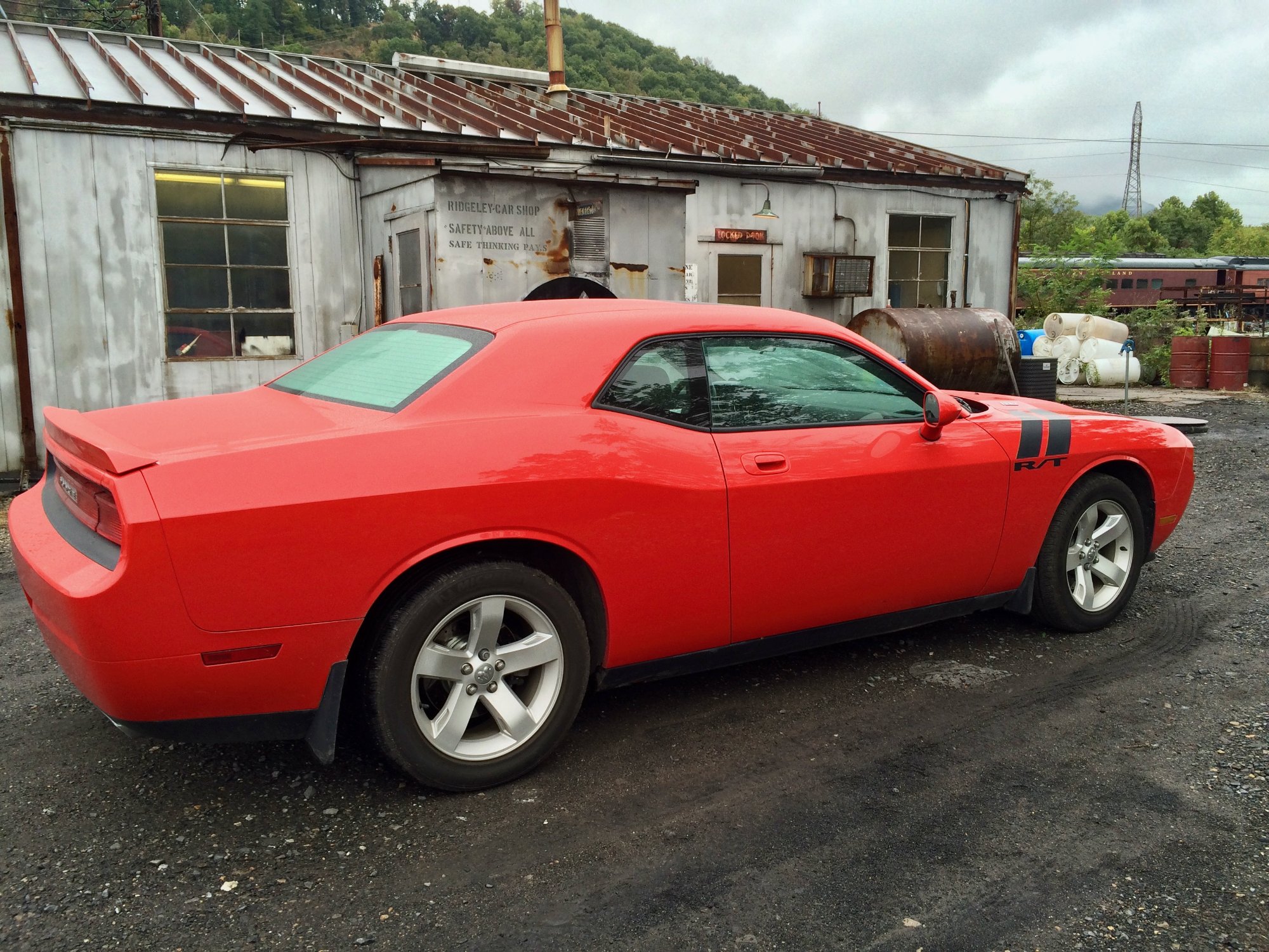 Solve Red Car by the Railroad jigsaw puzzle online with 192 pieces