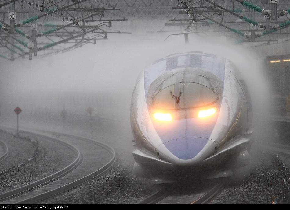 Solve Literally, slicing through the rain like a bullet creating its ...