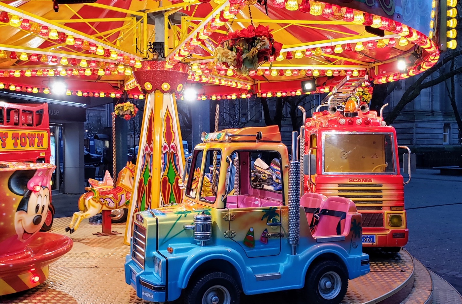 Solve Children’s Roundabout at the Fair jigsaw puzzle online with 24 pieces