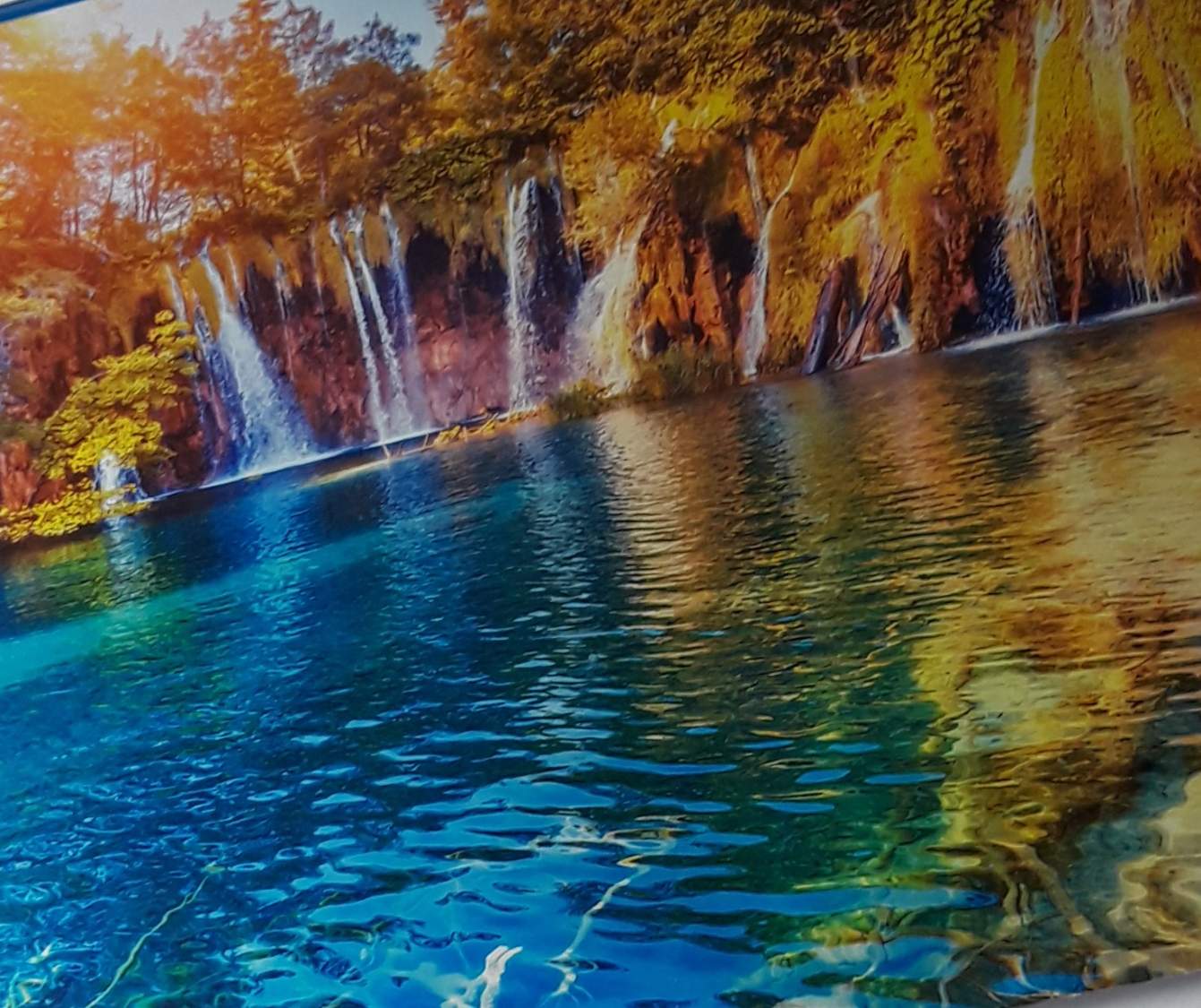 Solve Waterfalls in the Fall jigsaw puzzle online with 56 pieces