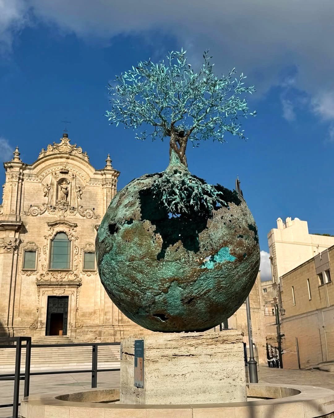 Solve The famous bronze Tree of Life statue in the heart of Matera ...