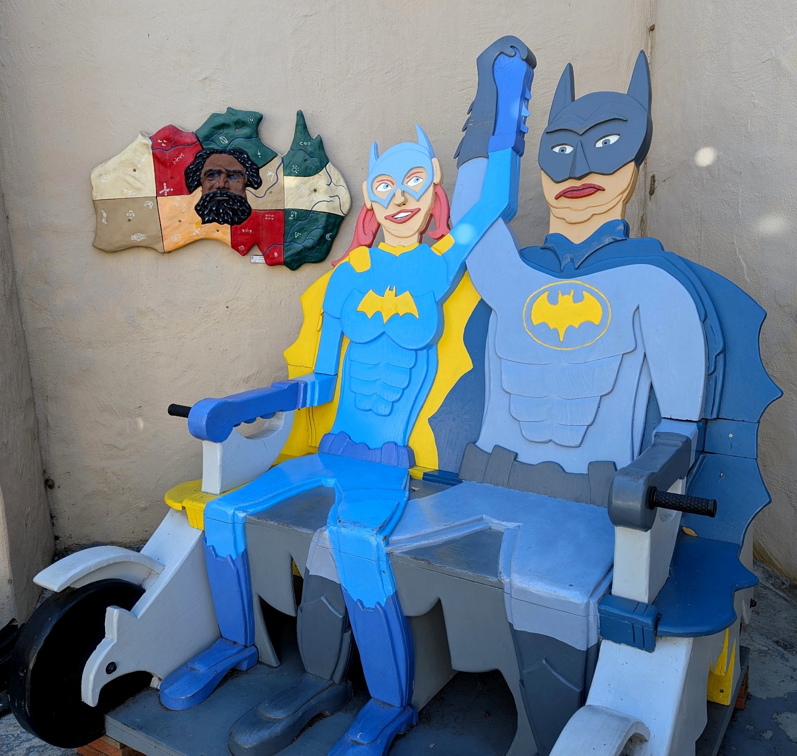 Solve Batman and Batgirl rolling bench--a must have! jigsaw puzzle ...