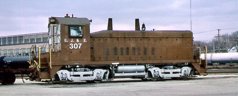 Solve EJ&E EMD SW1200 #307 drills cars at the east end (compass south ...