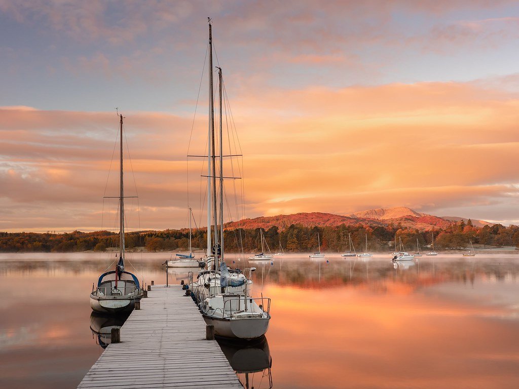 Solve Cold misty sunrise on Windermere jigsaw puzzle online with 154 pieces