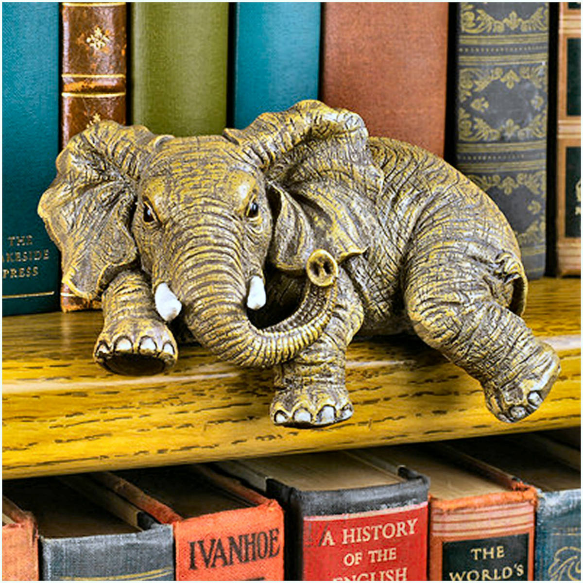 Solve Toscano Elephant Shelf Sitter Figurine jigsaw puzzle online with ...