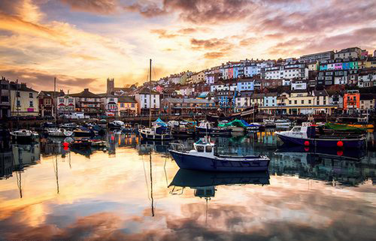Solve Brixham Harbour jigsaw puzzle online with 77 pieces