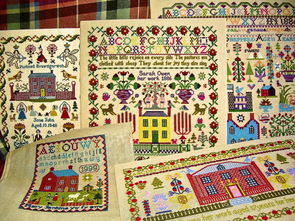 Solve Welsh Sampler Work jigsaw puzzle online with 63 pieces