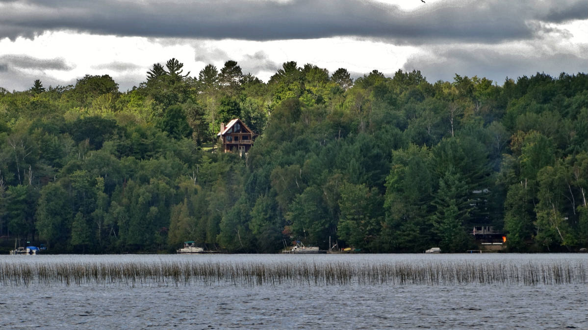 Solve Sun peeking through, overlooking Emily Lake, Florence County ...