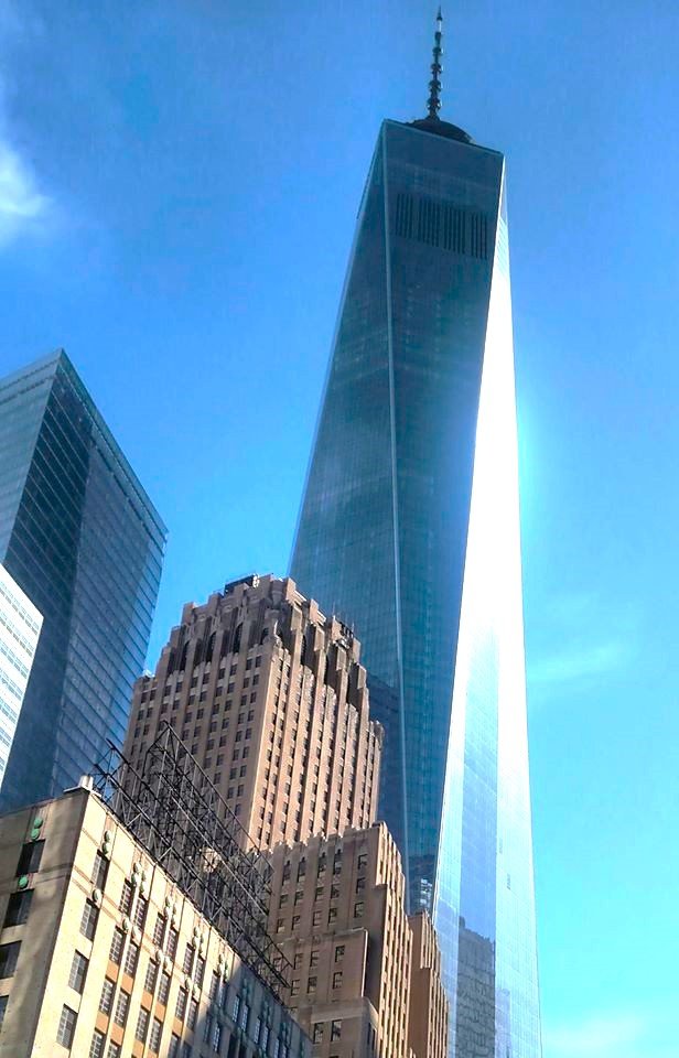 Solve Freedom Tower with reflected sky jigsaw puzzle online with 77 pieces