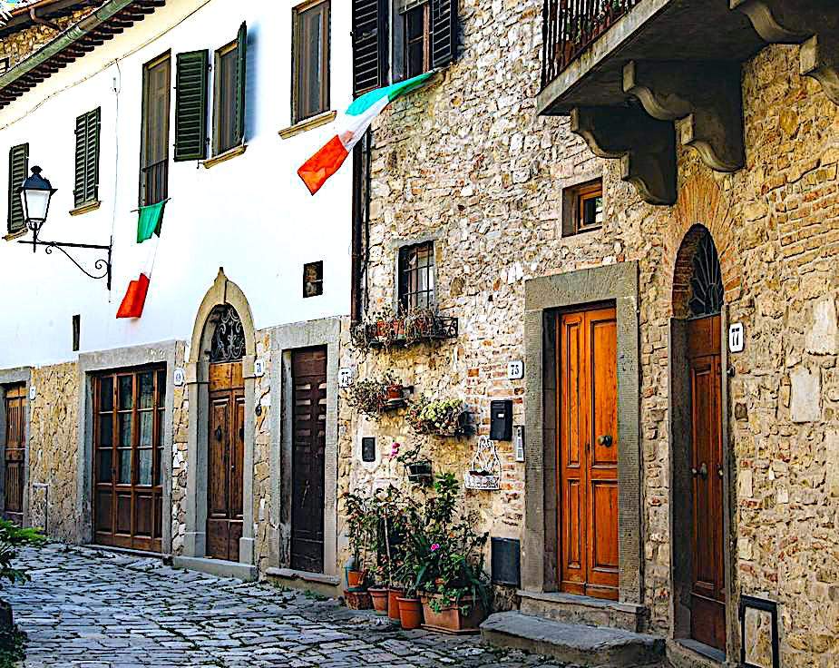 Solve stone row houses on cobbled street jigsaw puzzle online with 63 ...